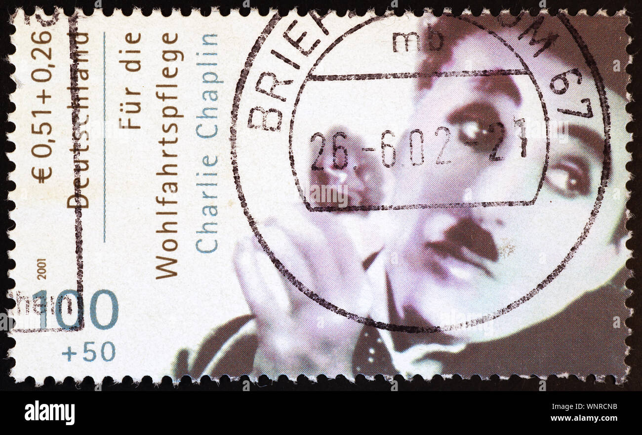 Portrait of Charlot on german postage stamp Stock Photo - Alamy