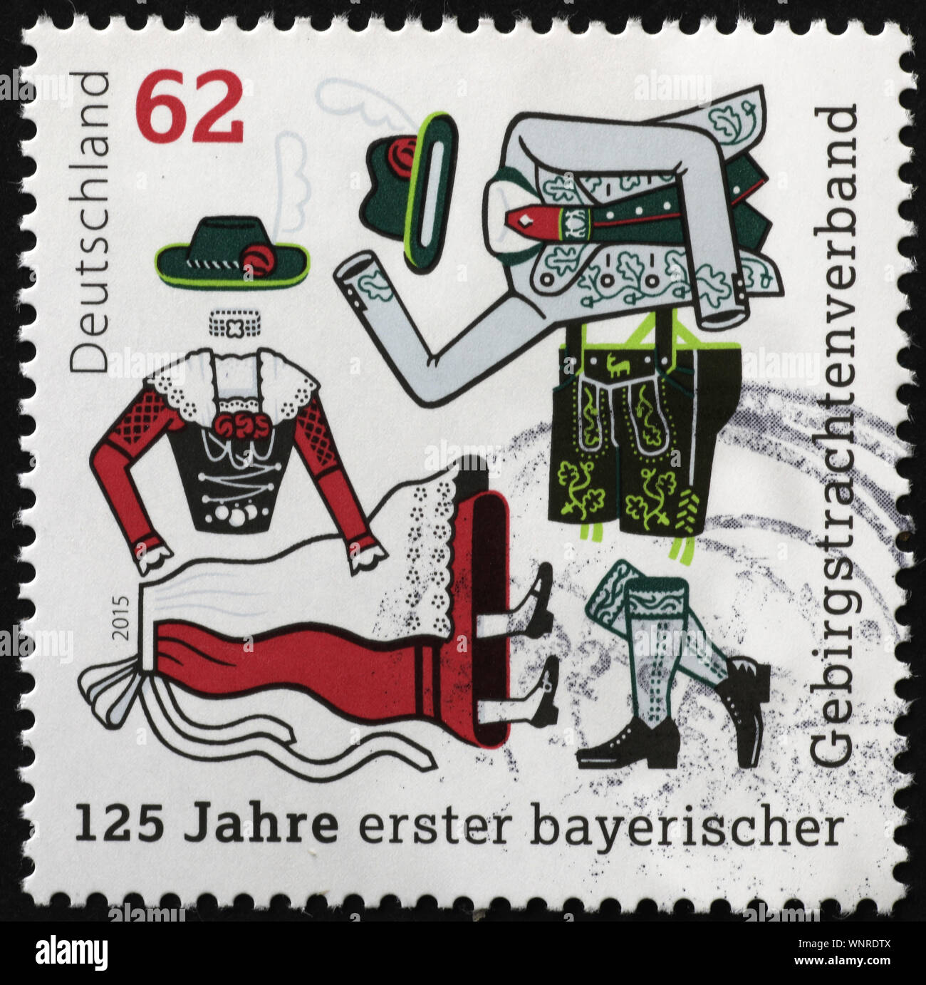 Traditional Bavarian costumes on german postage stamp Stock Photo - Alamy