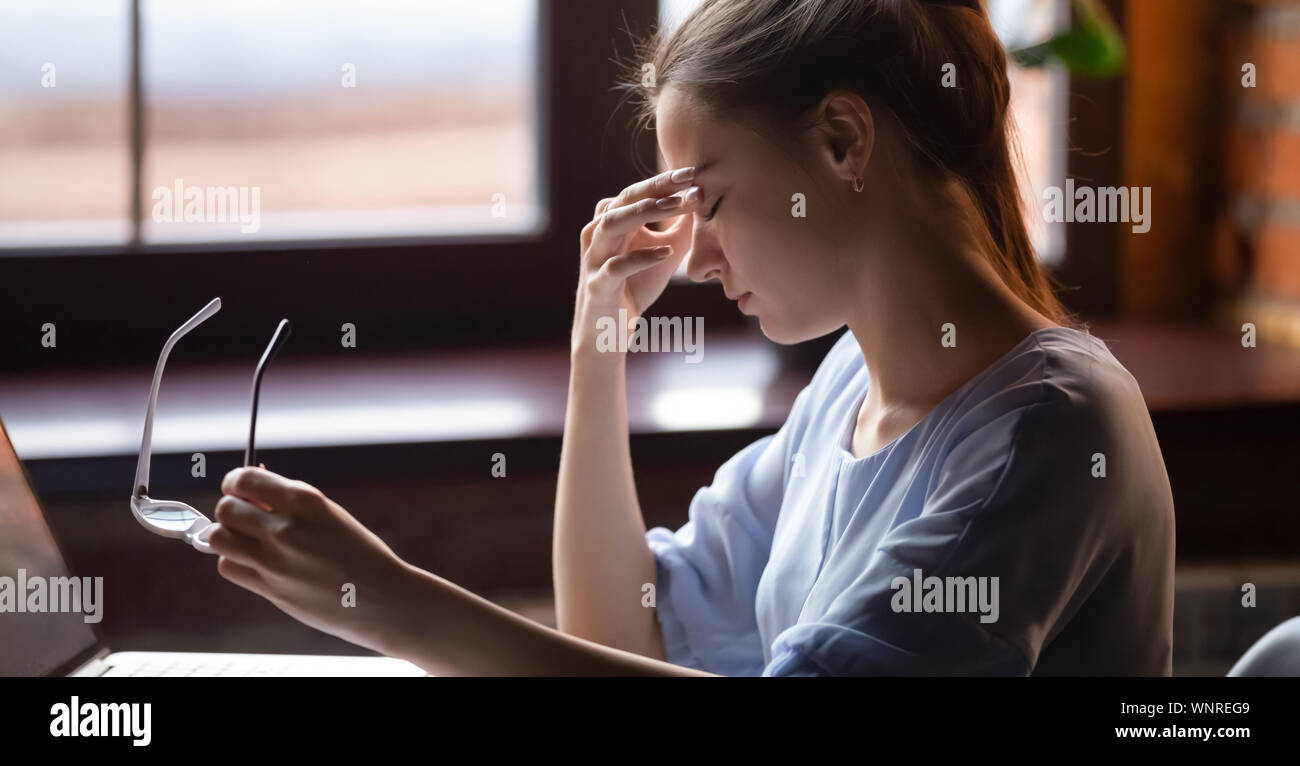 Tired woman taking off glasses, feeling eye strain, panoramic banner ...
