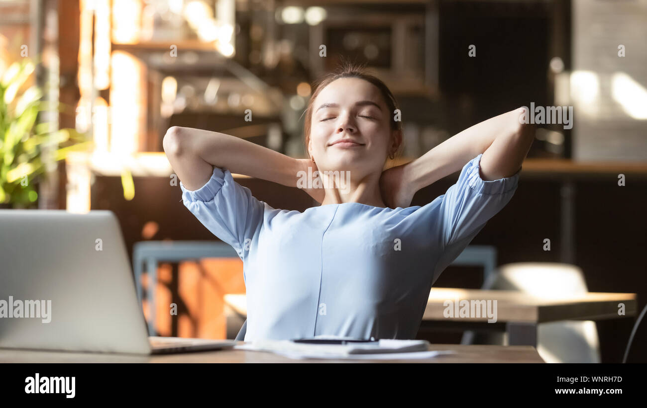 Calm woman man relaxing after finish computer work in coffeehouse Stock ...