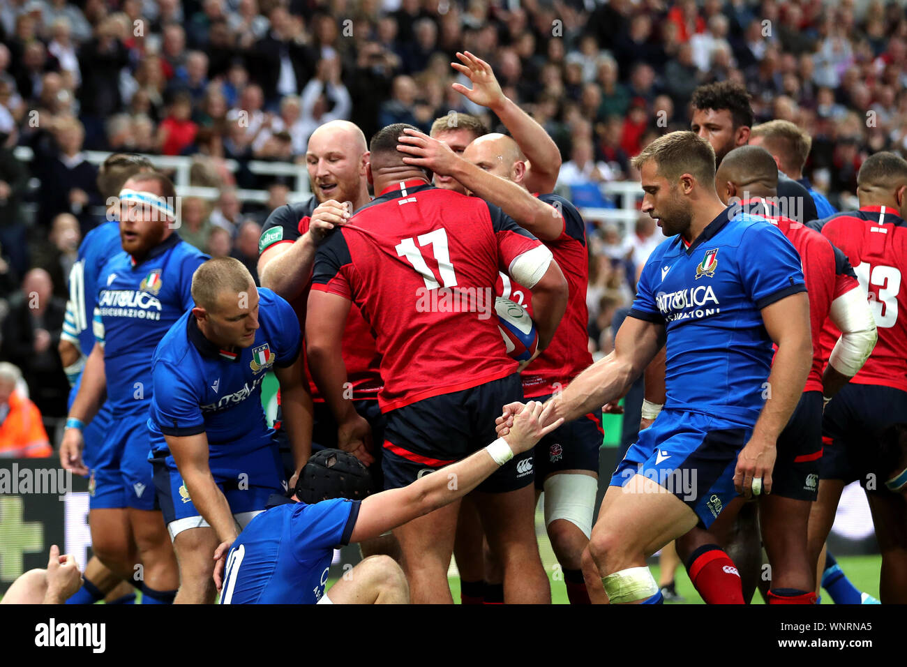 England's Ellis Genge (centre) celebrates scoring with teammates during ...