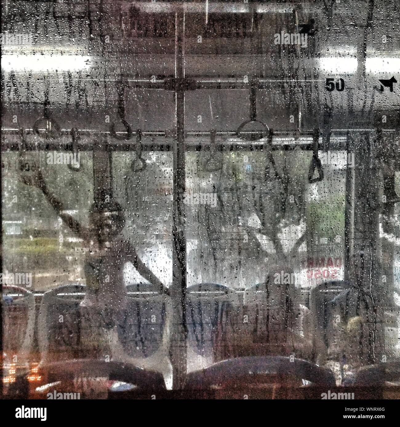 Reflection in bus window in hi-res stock photography and images - Alamy