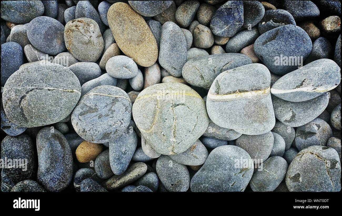 Large grey smooth pebbles hi-res stock photography and images - Alamy