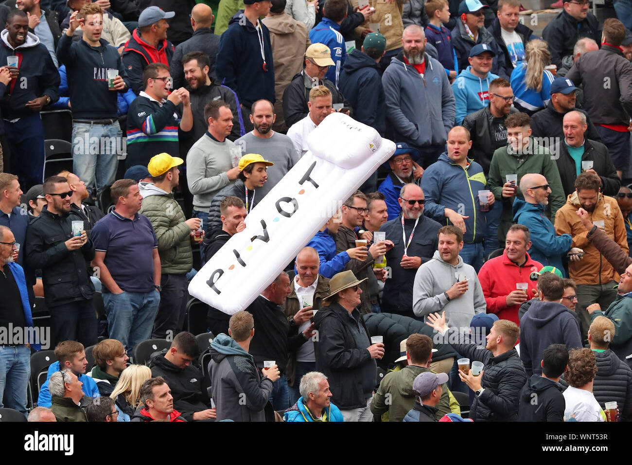 MANCHESTER, ENGLAND. 06 SEPTEMBER 2019: fans throw an inflatable bed in ...