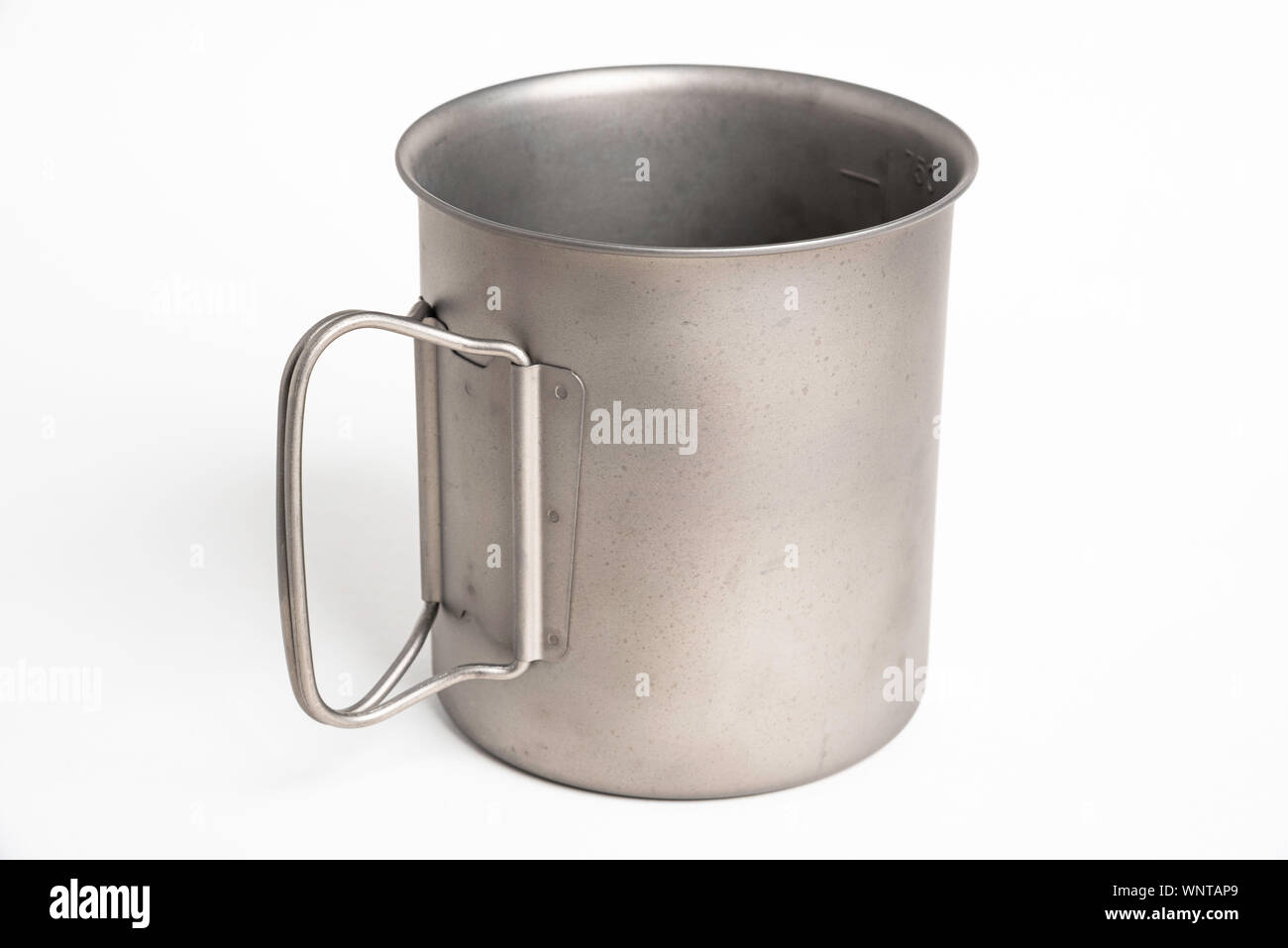 An all-metal multiple purpose mug with flexible handle and measuring ...