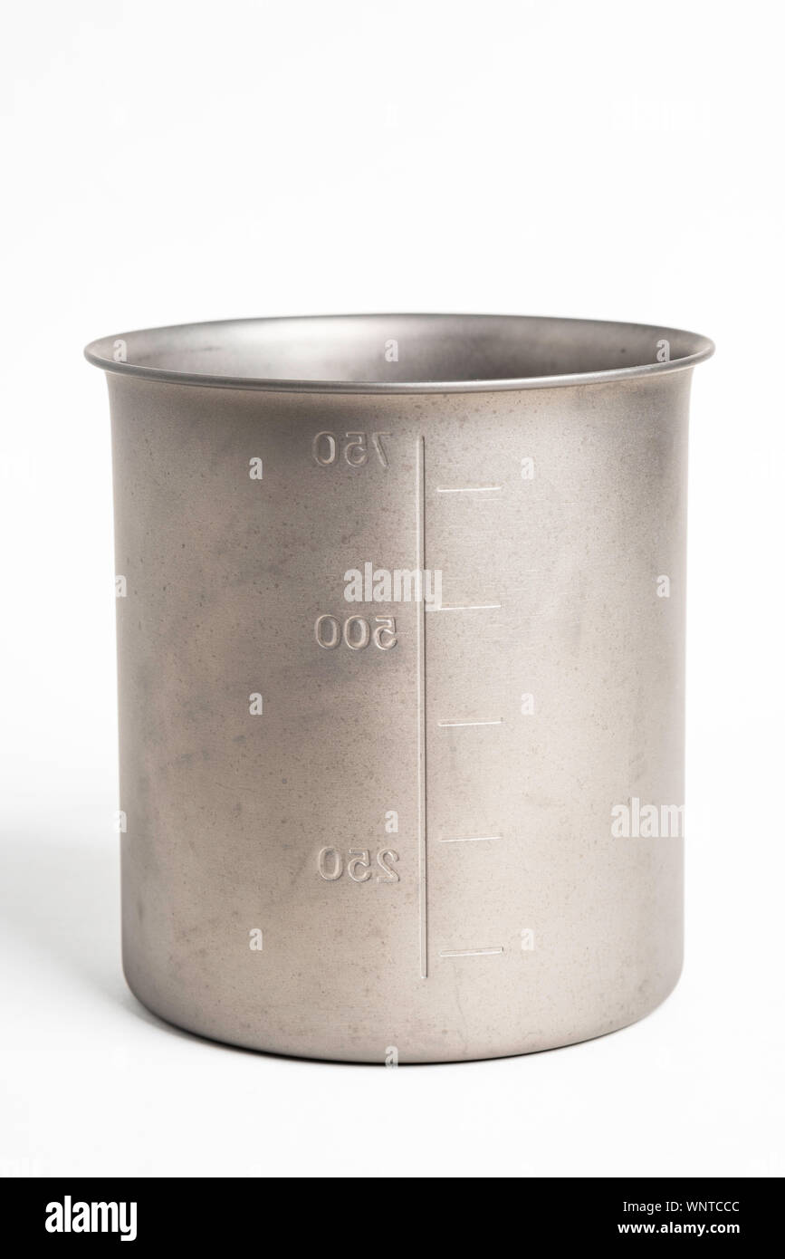 An all-metal multiple purpose mug with flexible handle and measuring ...