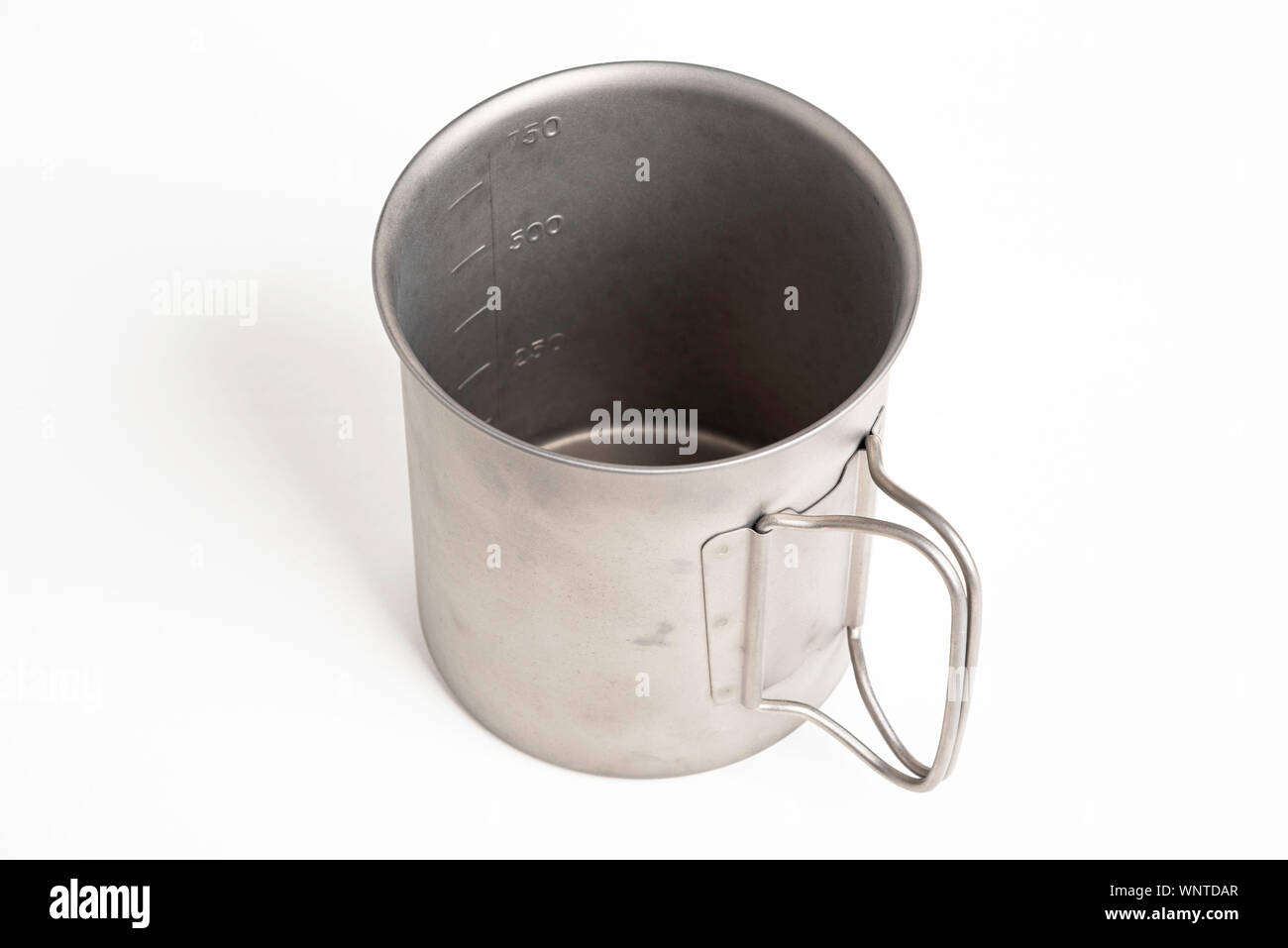 An all-metal multiple purpose mug with flexible handle and measuring ...