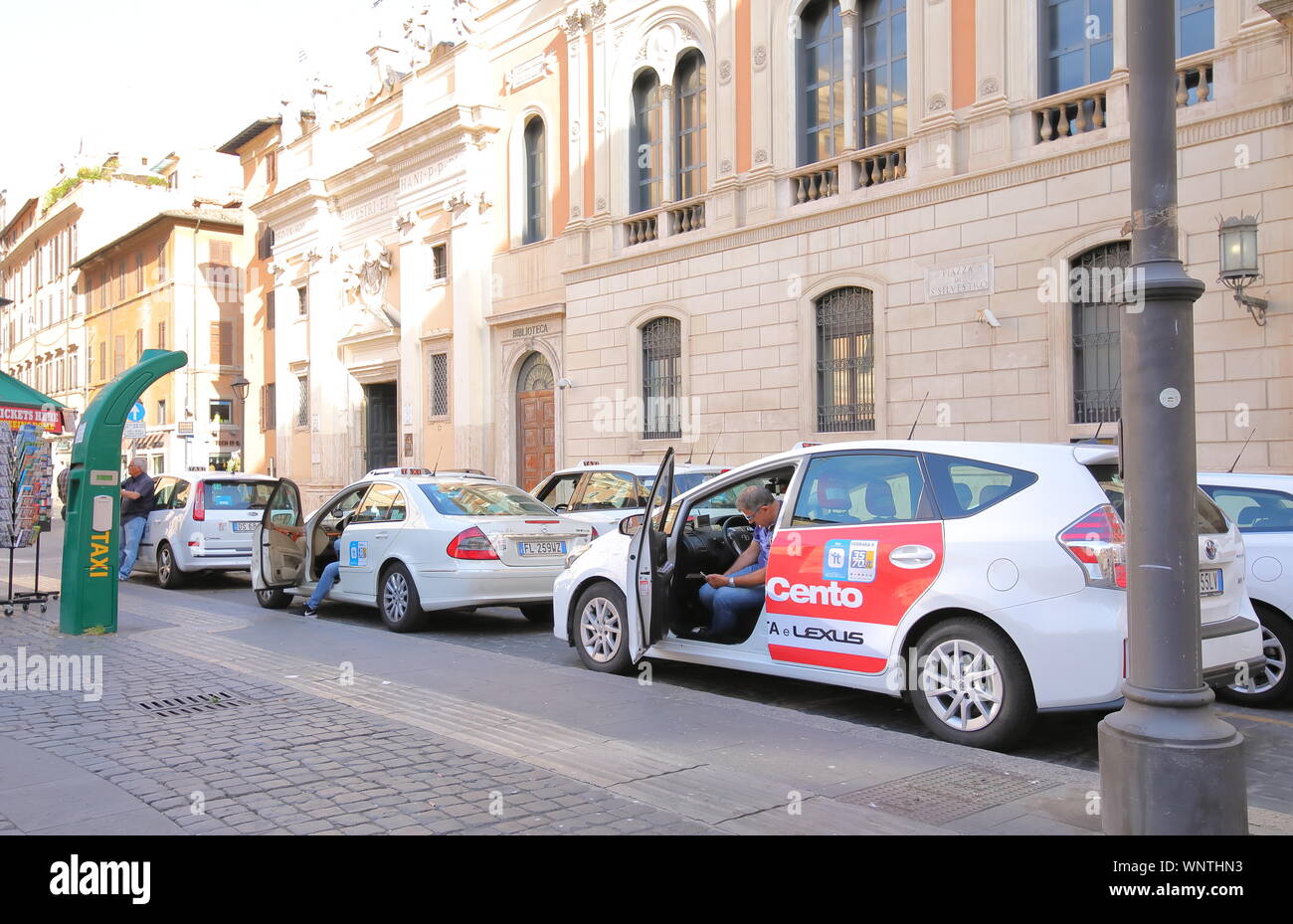 Taxi driver wait for passengers in downtown Rome Italy Stock Photo - Alamy