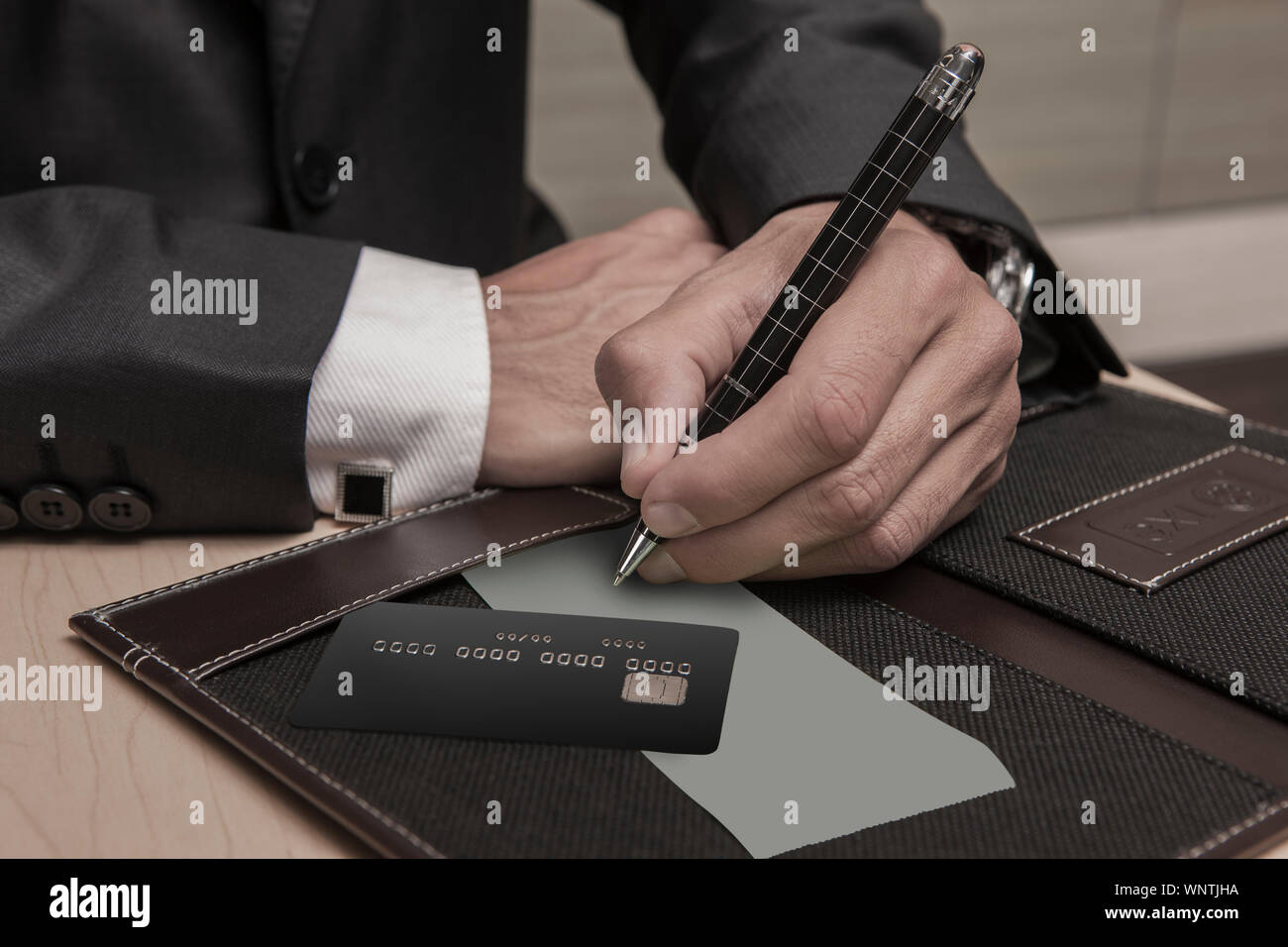 Signing bank card hi-res stock photography and images - Alamy