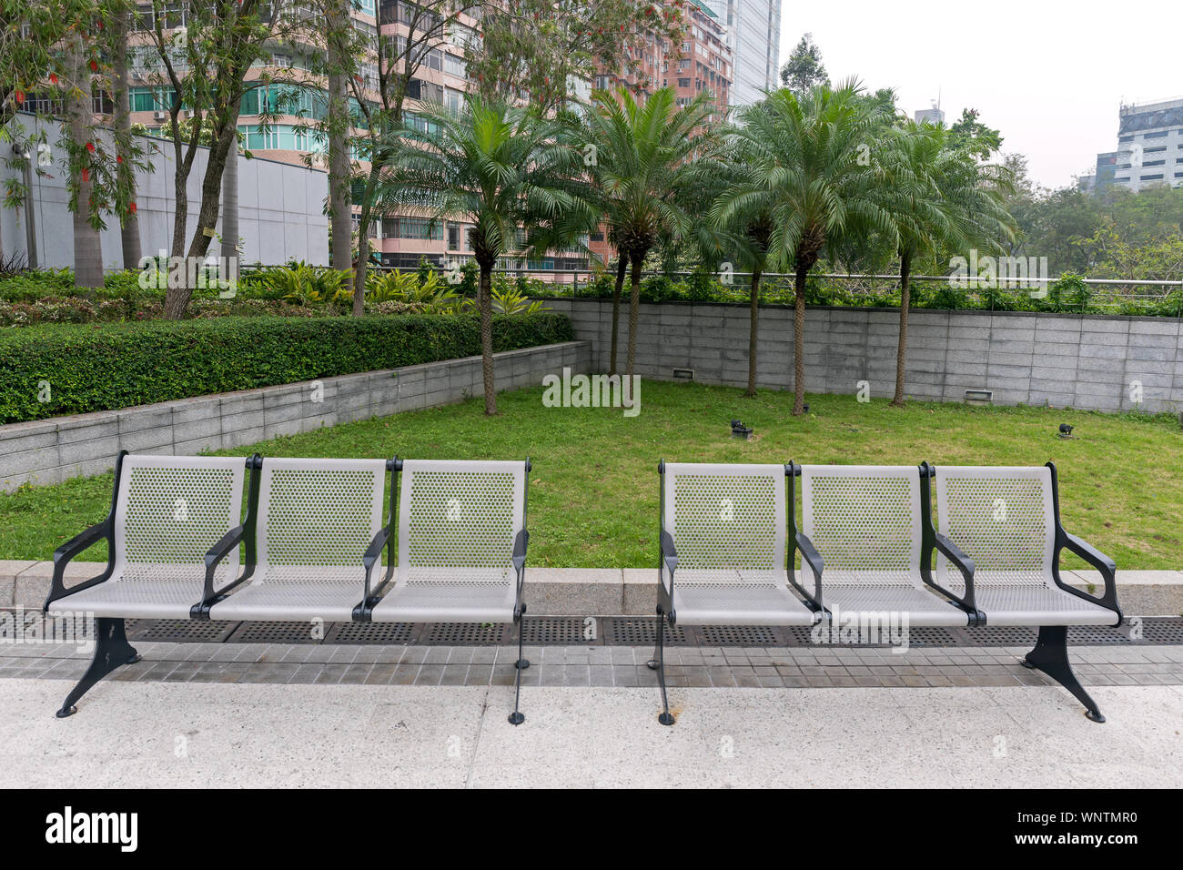 New Metal Bench in Park Hong Kong Stock Photo - Alamy