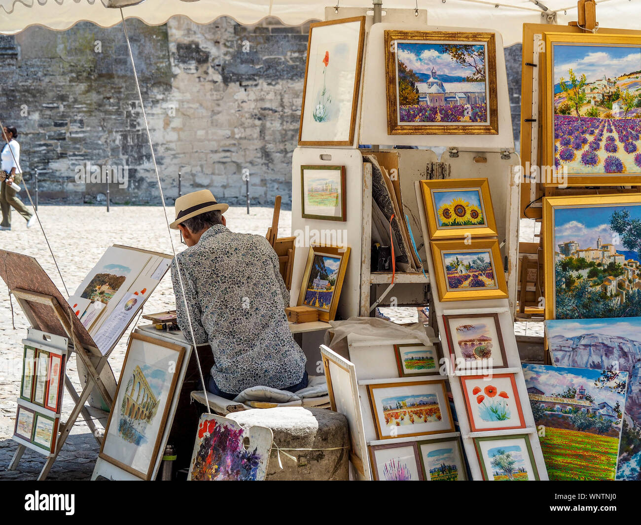 Local artist paints according to French custom of en plein air while ...