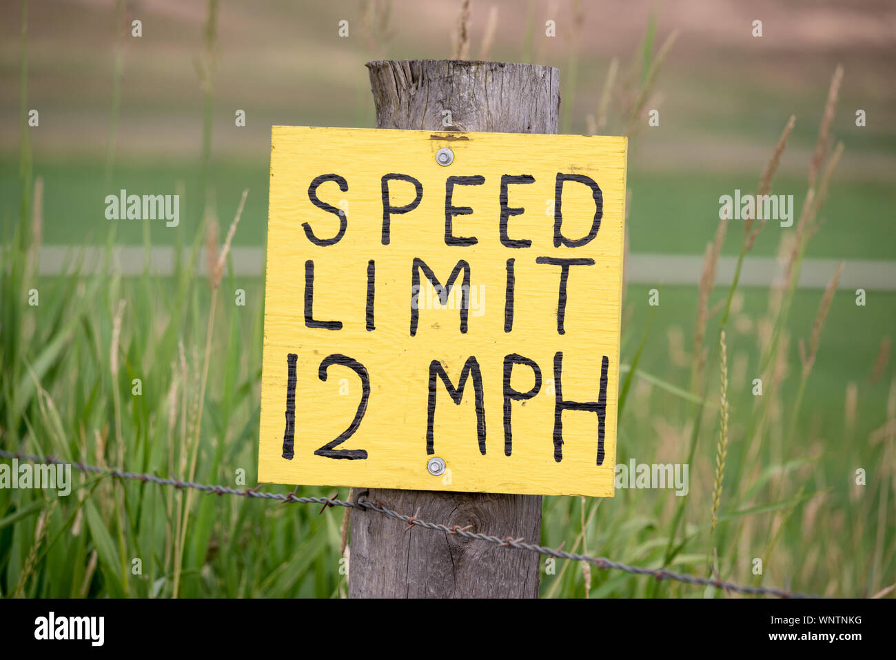 Speed limit 12MPH sign on a ranch road in Oregon's Wallowa Valley Stock ...