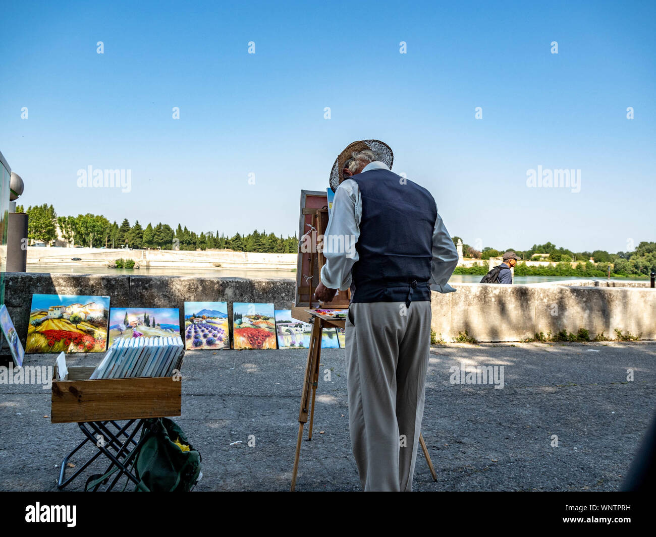 Local artis working en plein air, or outdoors by the Rhone River Stock ...