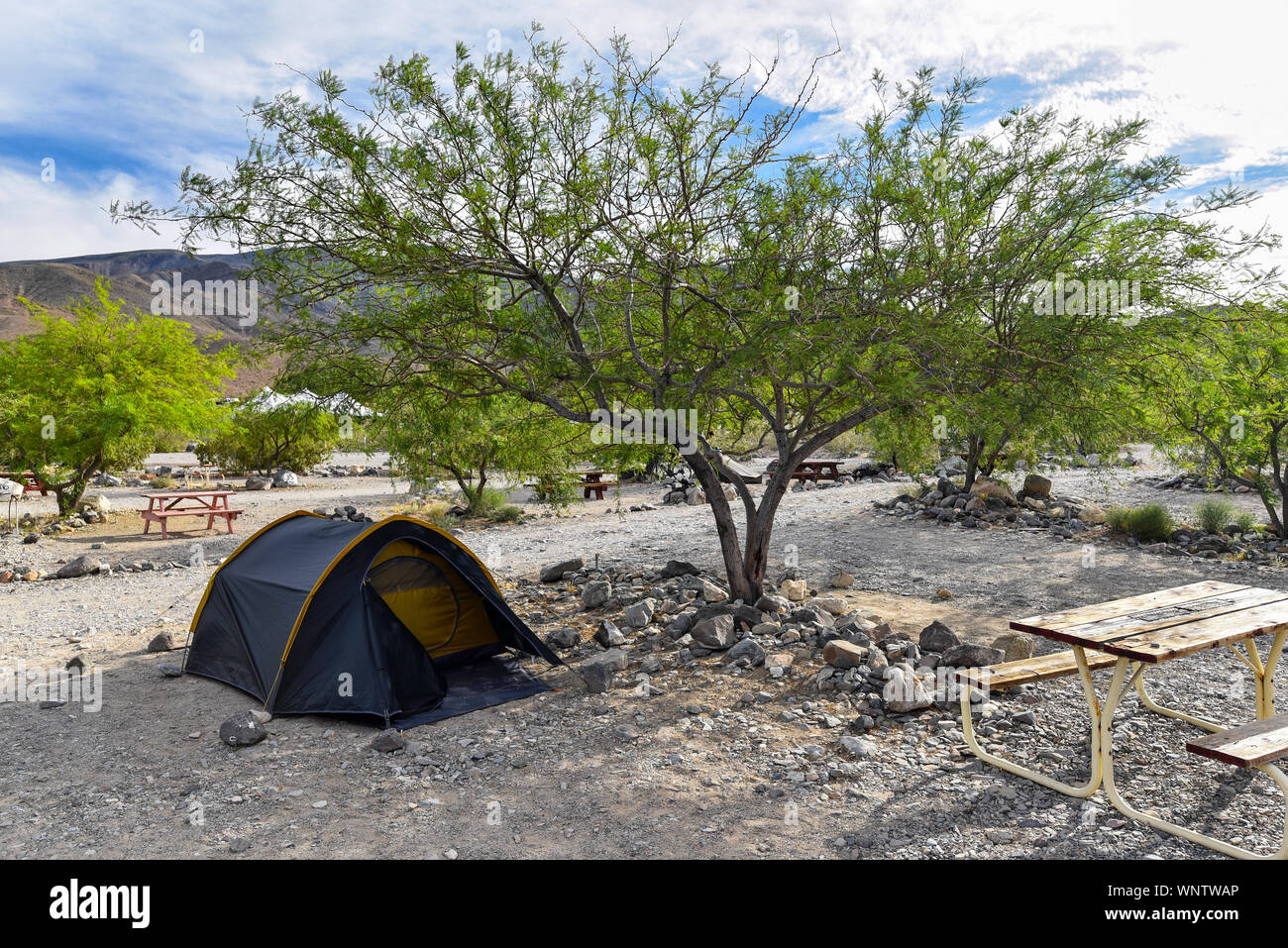 Campsite set up in the arid and rocky soil of Death Valley in Panamint ...