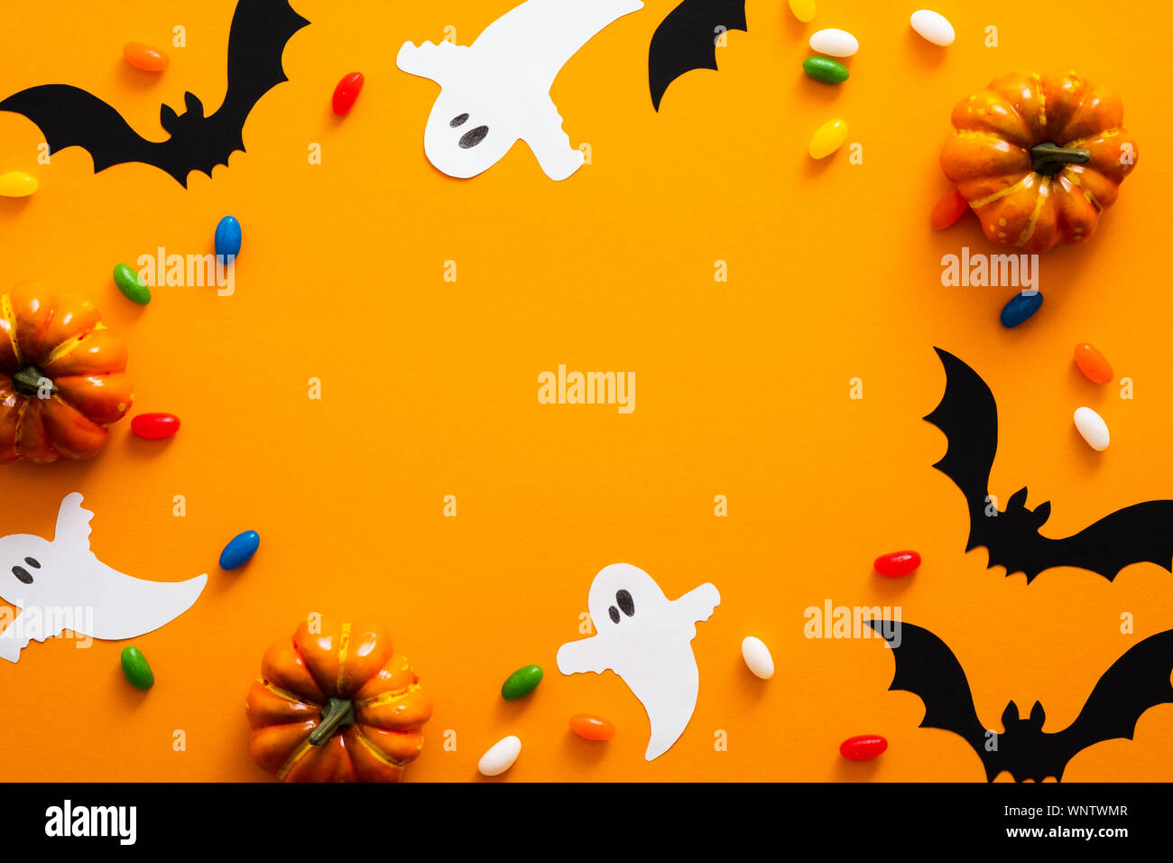 Happy halloween holiday concept. Halloween decorations, pumpkins, bats ...