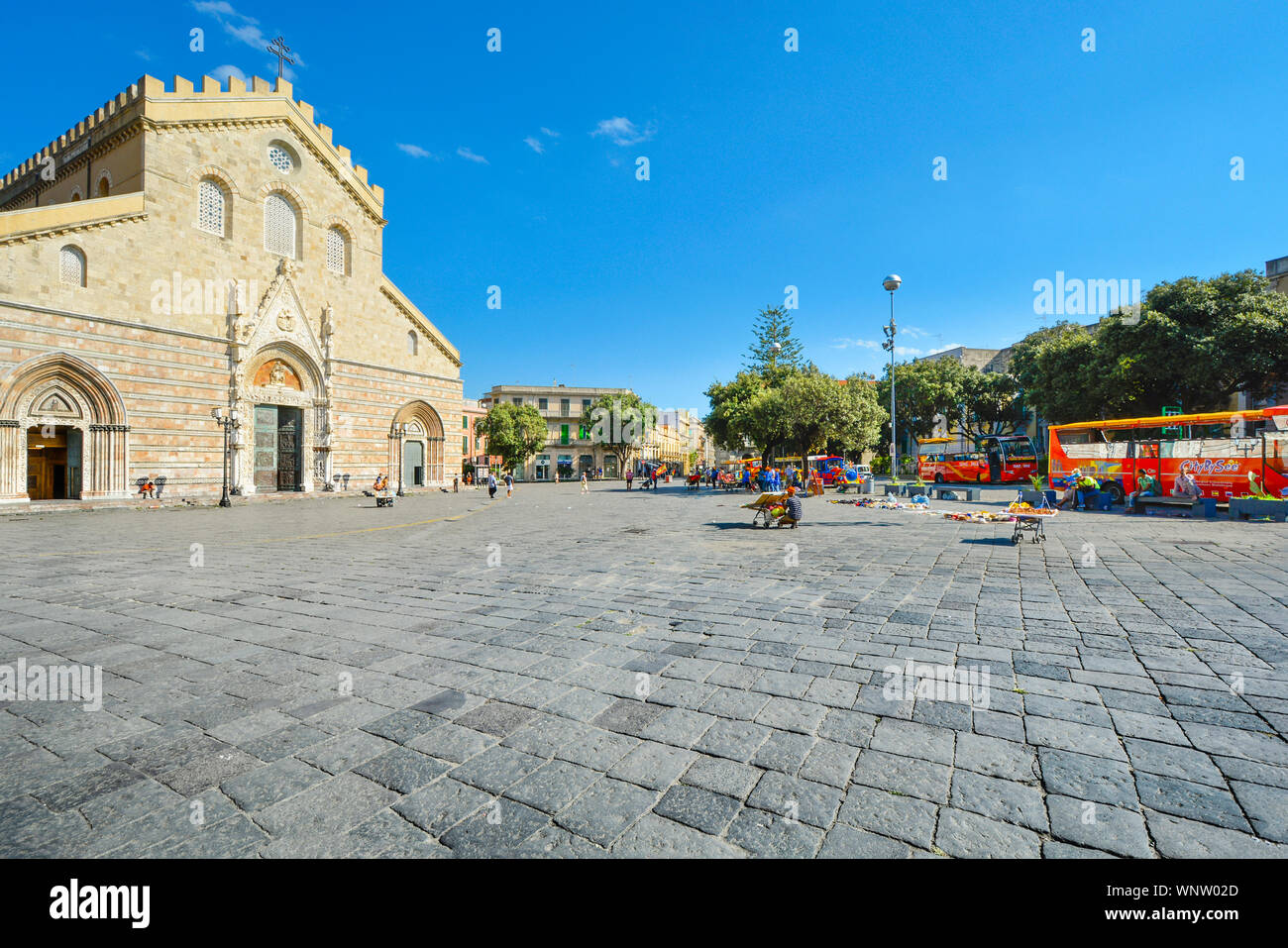 Tourists visit the Messina Cathedral and it's ornate bell tower on the ...