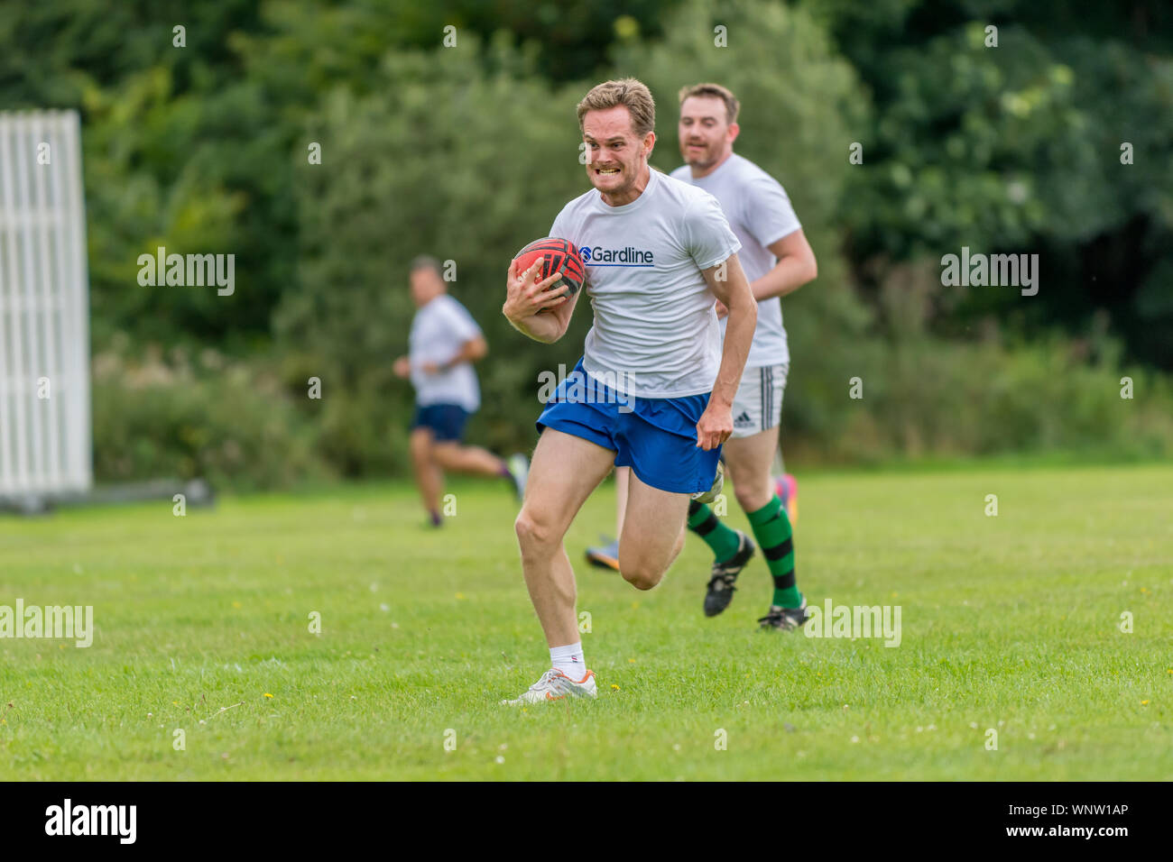 Sprinting for the ball hi-res stock photography and images - Alamy