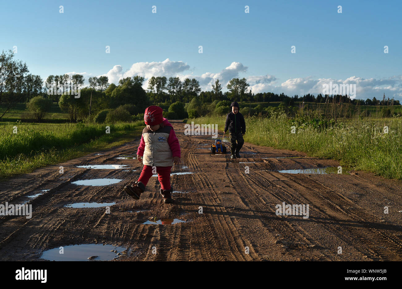 Road children hi-res stock photography and images - Alamy