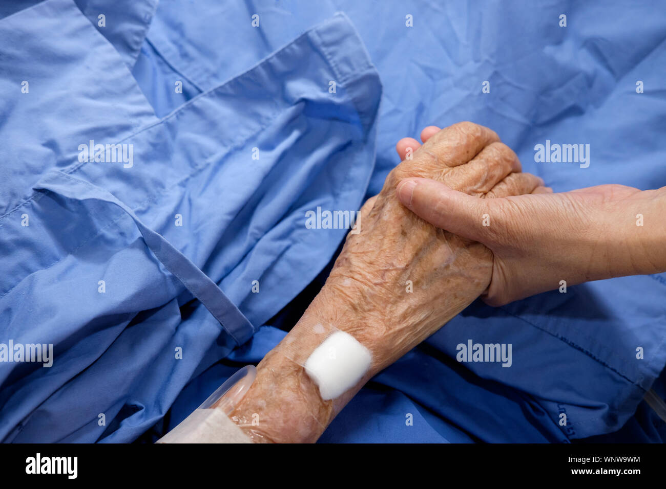 Doctor bed hand hi-res stock photography and images - Alamy