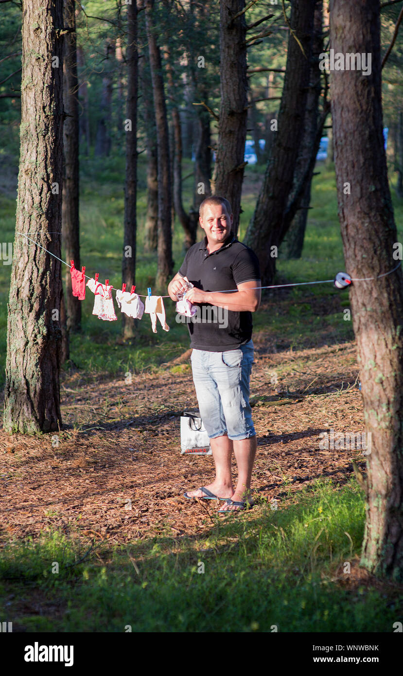 Drying the clothes hi-res stock photography and images - Alamy
