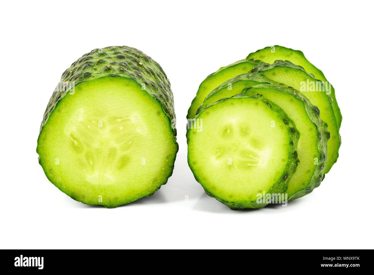 Sliced fresh cucumber isolated on white background with clipping path ...