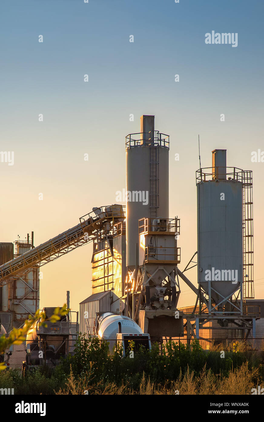 Silo and machinery for concrete mix and loading Stock Photo - Alamy