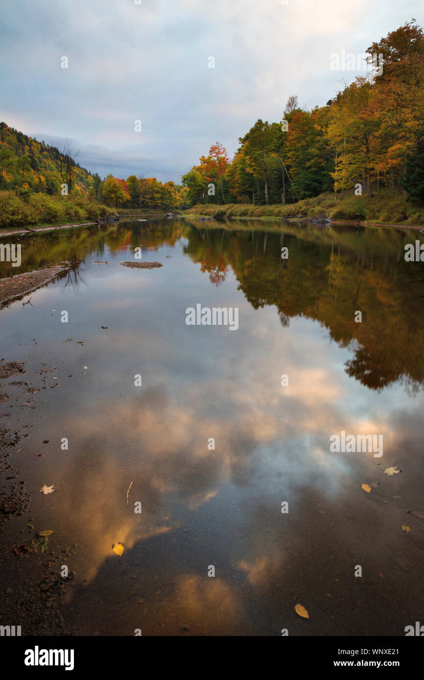 Fall colors reflect ponds and rivers during leaf-peeping moments in New ...