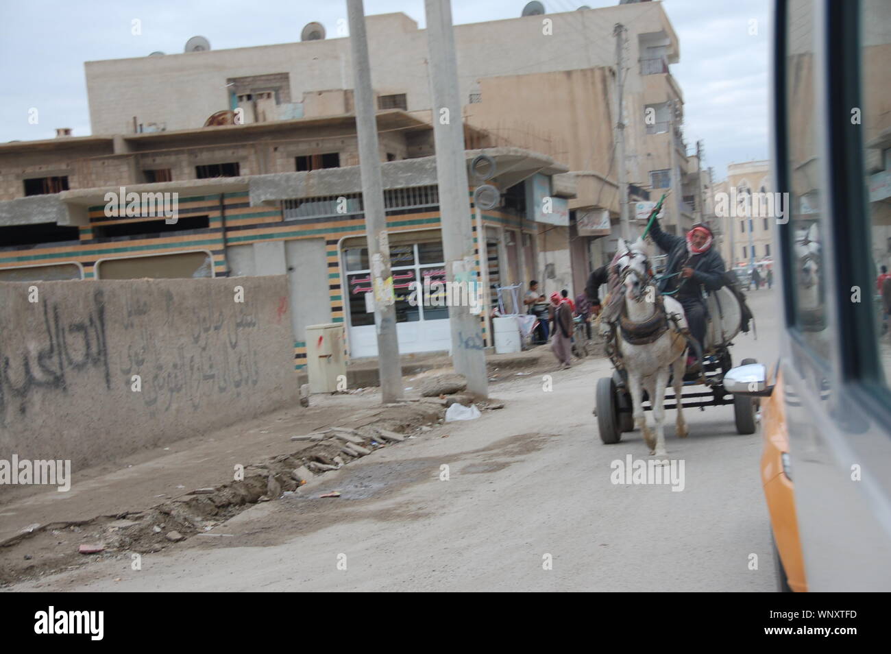 calash in a street of Hama Stock Photo - Alamy