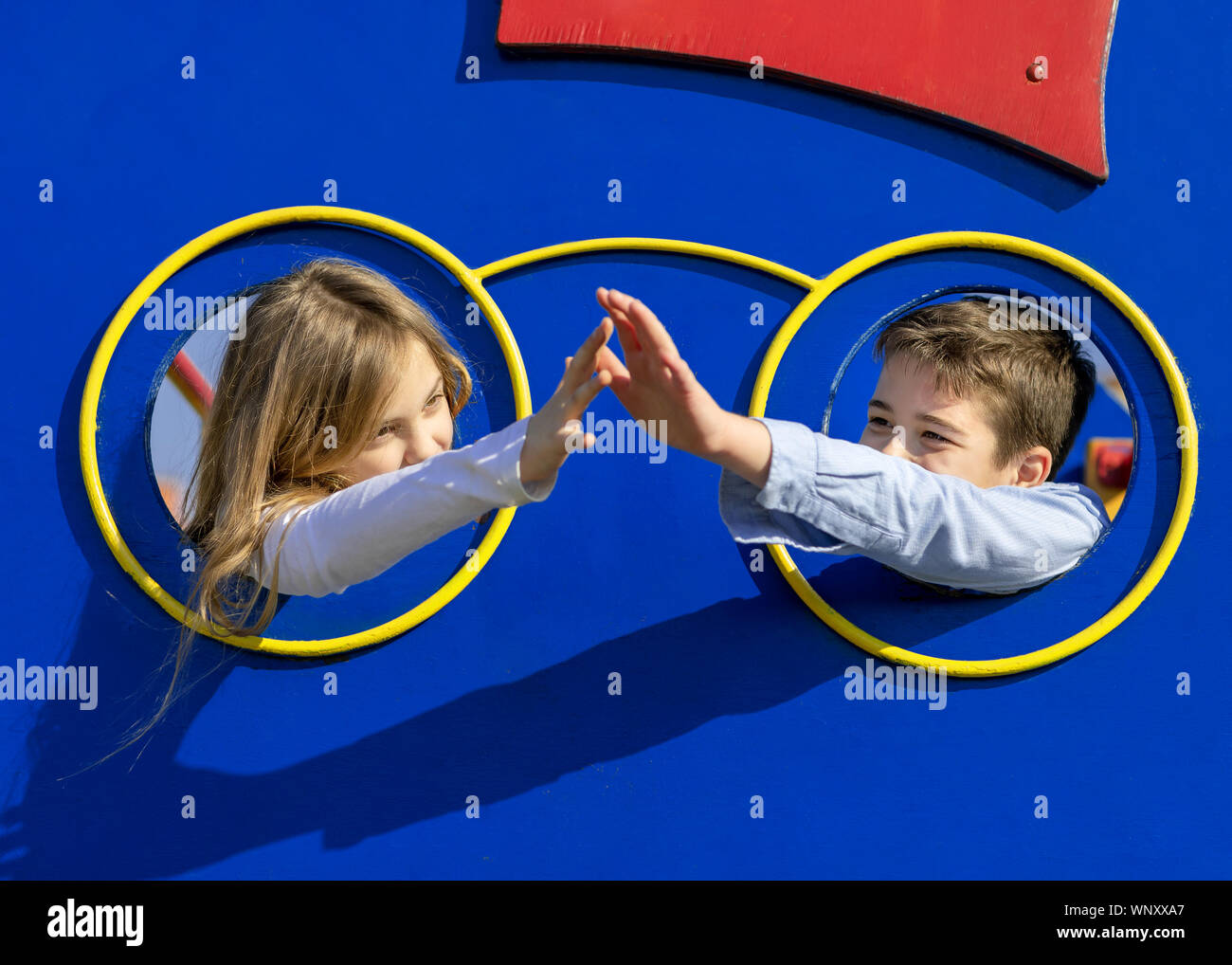 Children connecting hi-res stock photography and images - Alamy