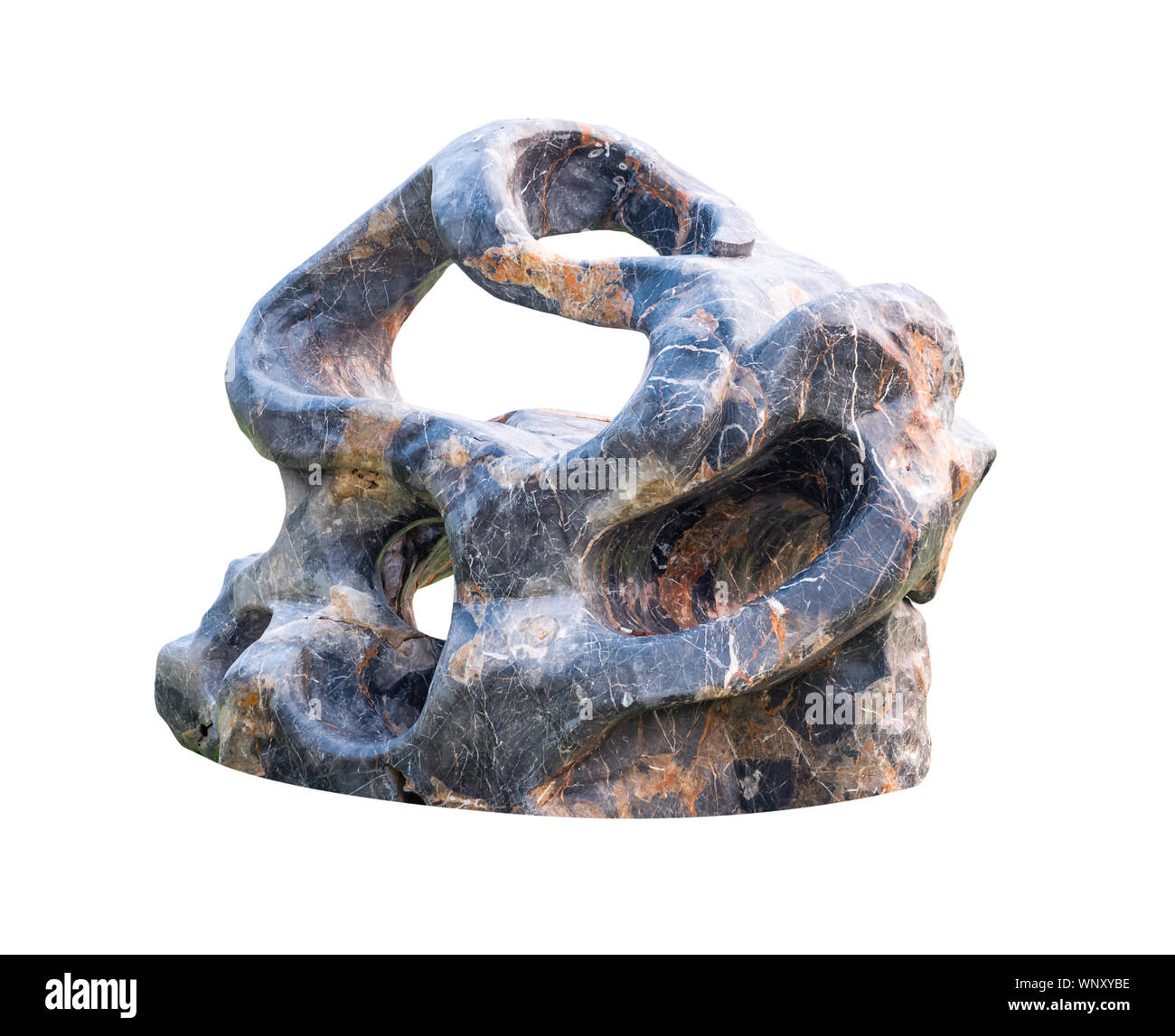 Abstract of big granite ,marble rock stone with holes in the garden zen ...