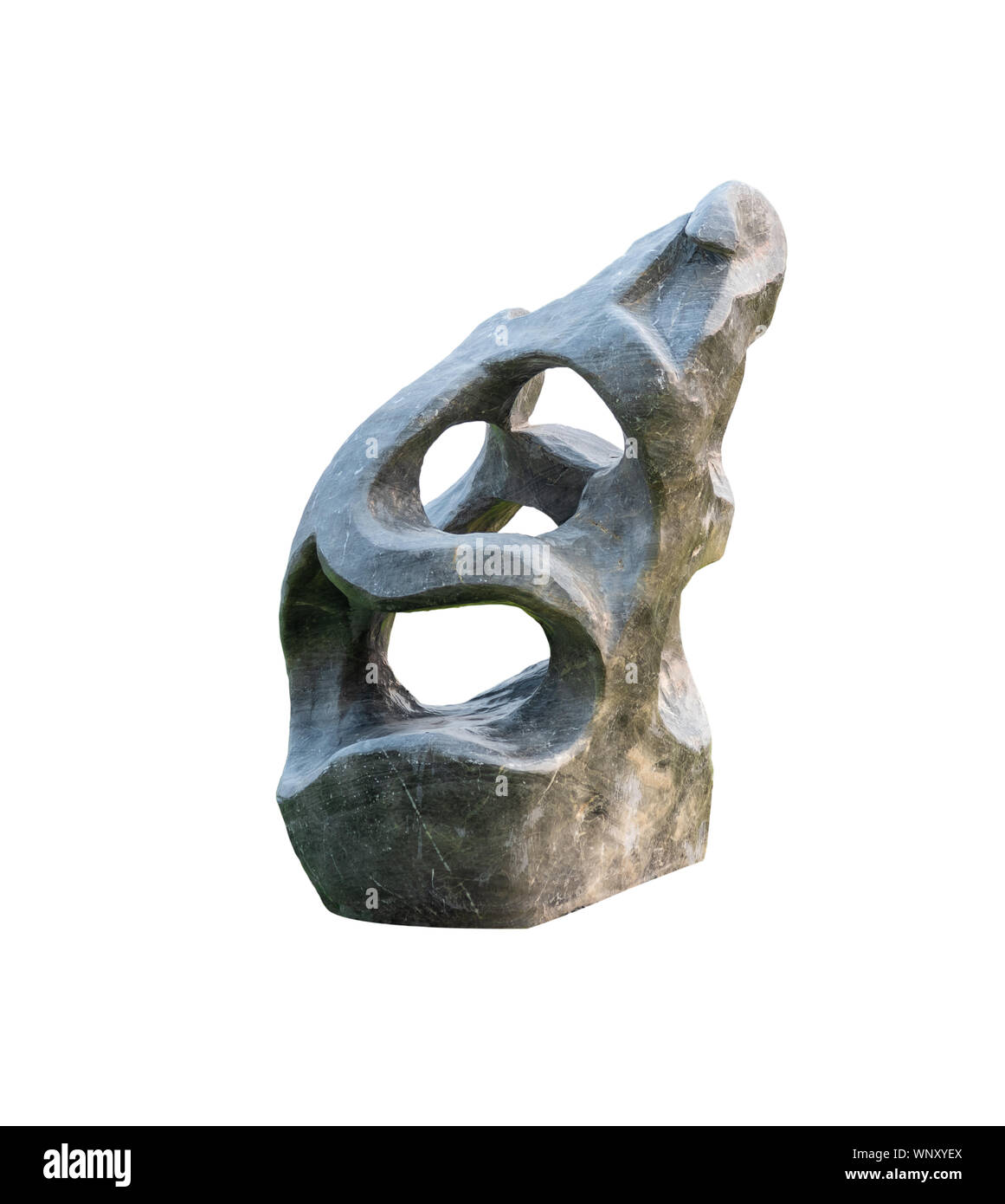 Abstract of big granite ,marble rock stone with holes in the garden zen ...