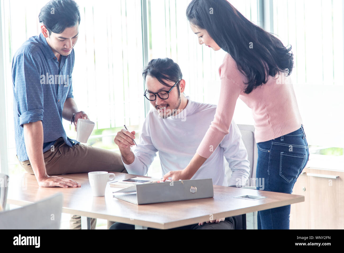 Teamwork business concept .Start up business people in modern office ... Teamwork business concept .Start up business people in modern office ...