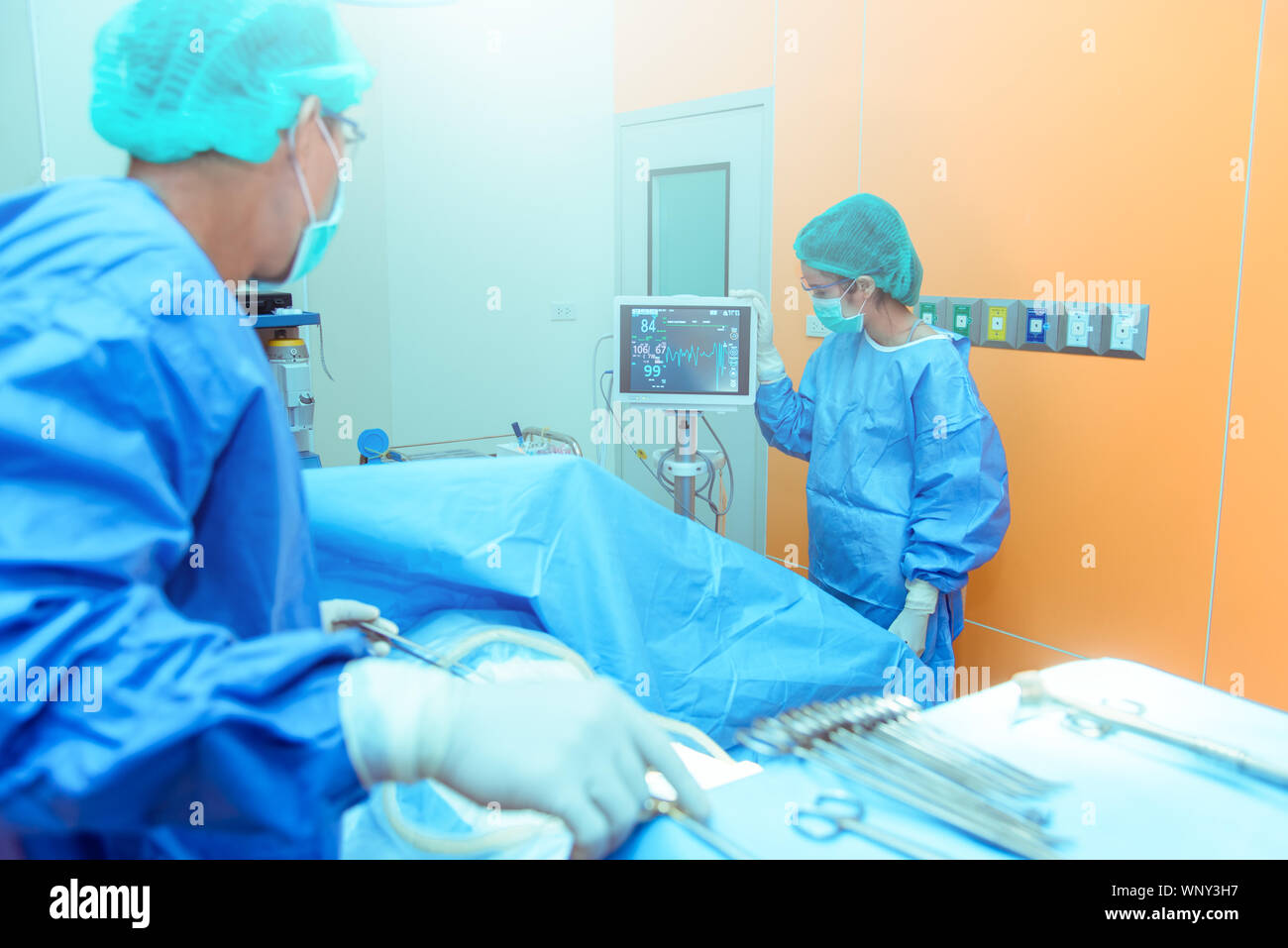 Doctor and assistant nurse operating for help patient from dangerous ...