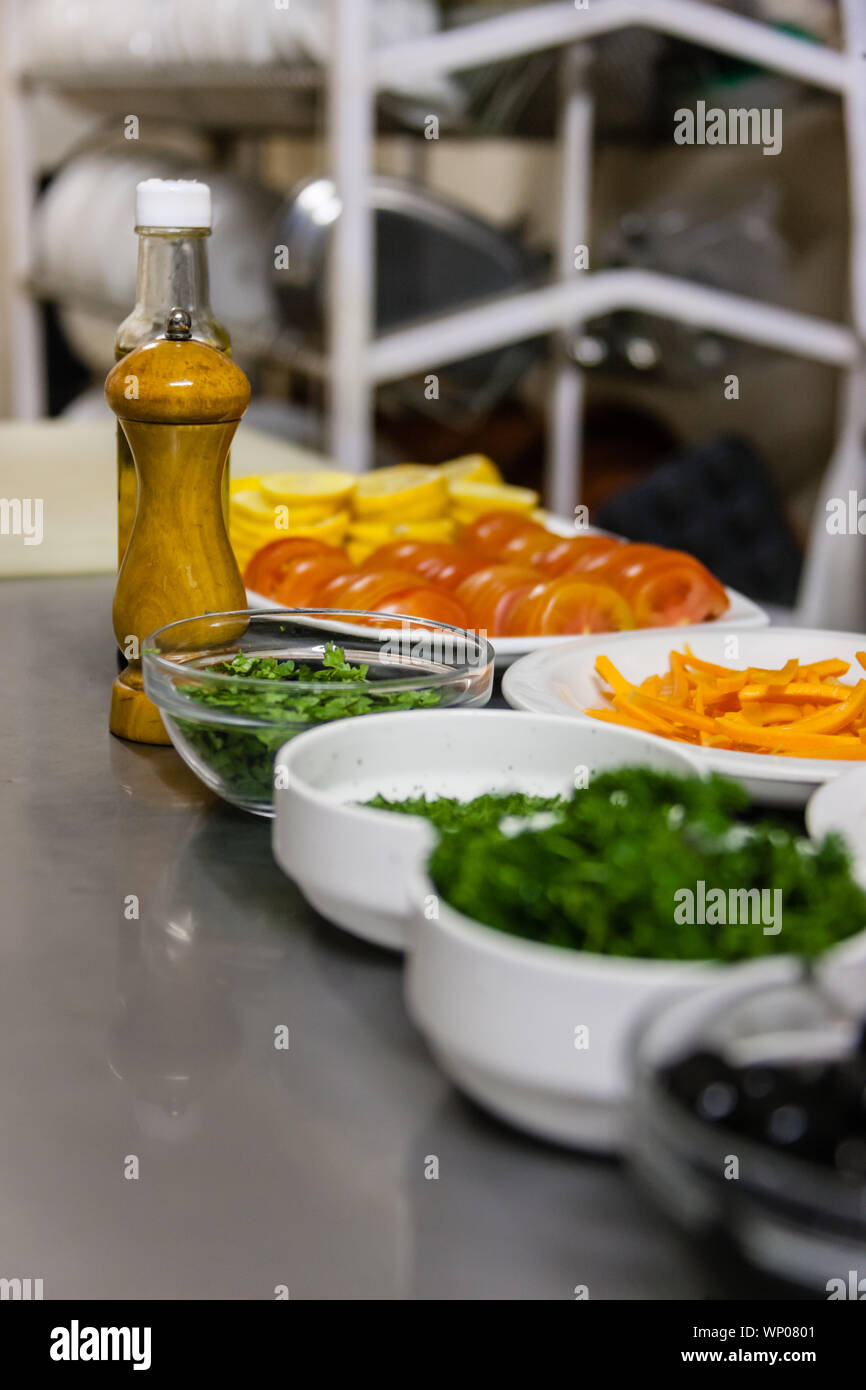 Healthy ingredients on a restaurant kitchen table, ready to go for the ...