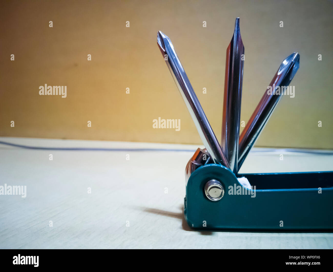 Multi Screw driver with different pins tools Stock Photo - Alamy