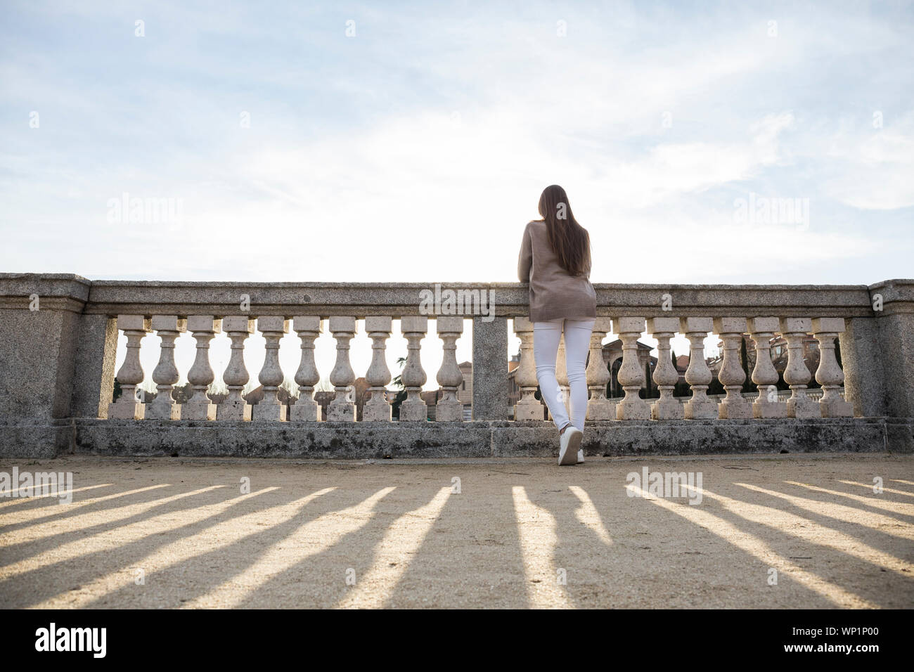 Leaning over railing hi-res stock photography and images - Alamy