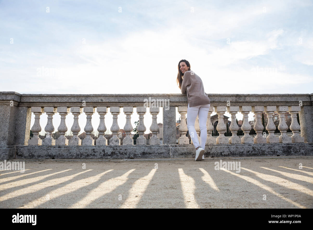 Leaning over railing hi-res stock photography and images - Alamy