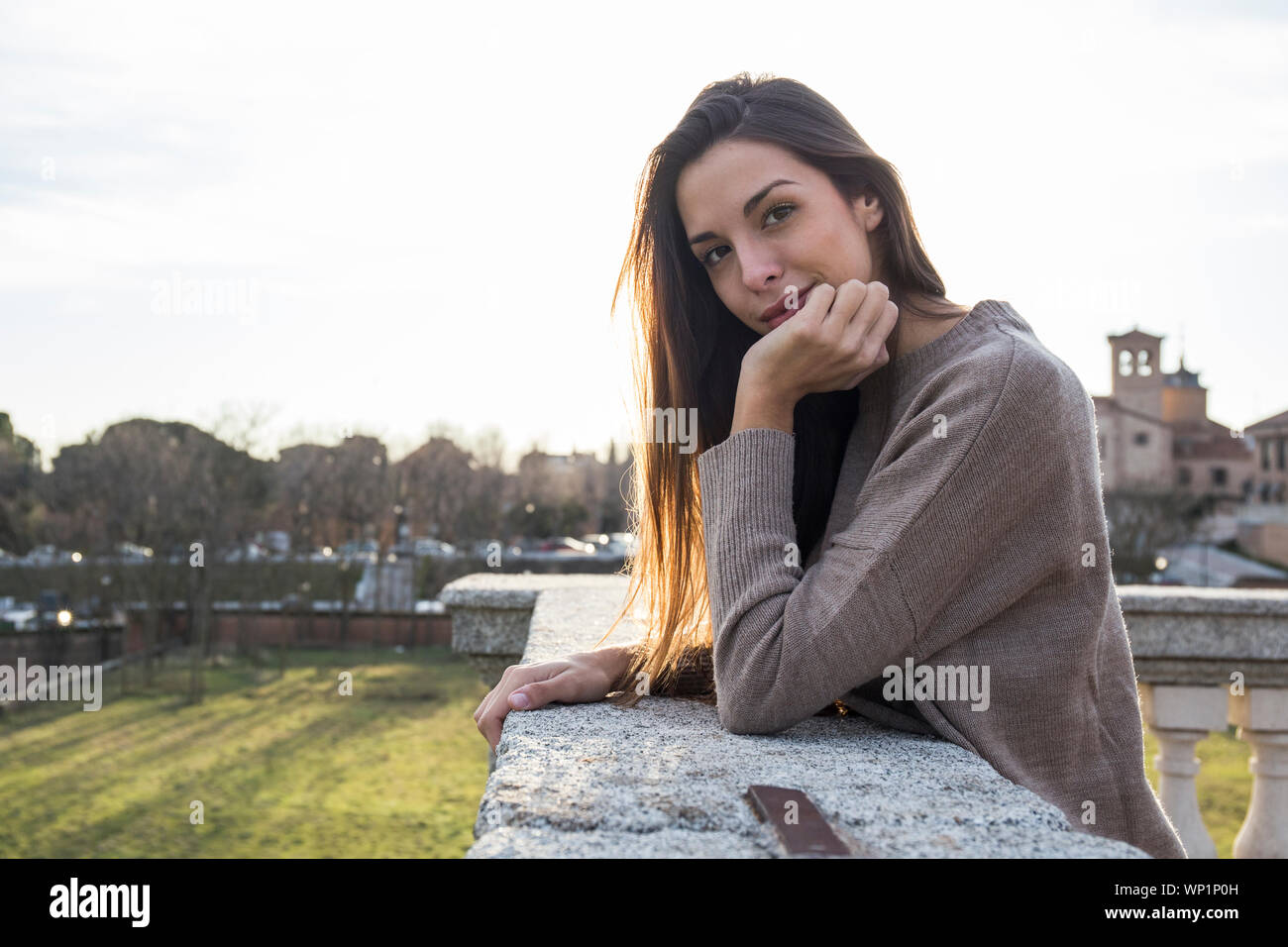 Woman resting head on hand hi-res stock photography and images - Alamy