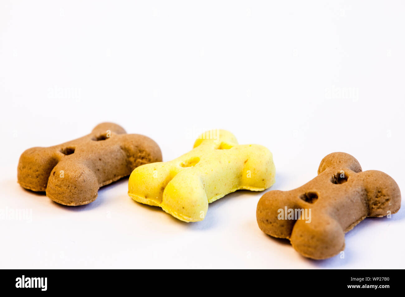 Dog food closeup on white background Stock Photo - Alamy