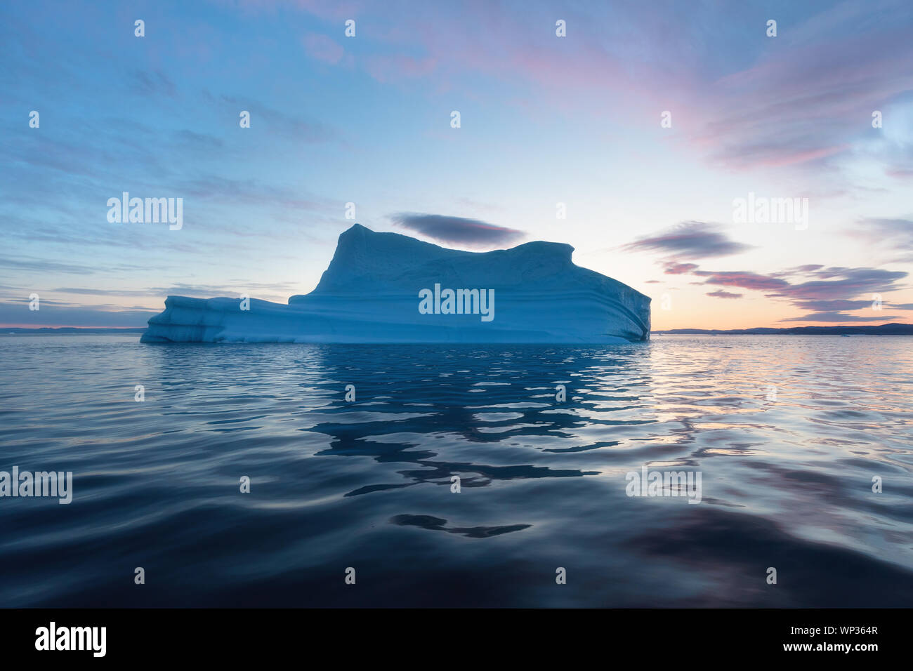 Icebergs in front of the fishing town Ilulissat in Greenland. Nature ...