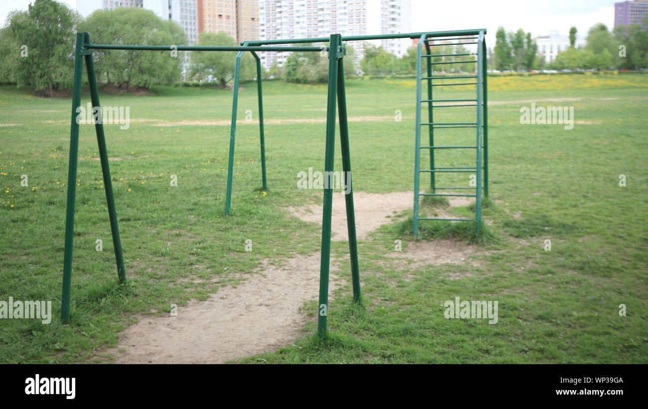 horizontal bar in city park Stock Photo - Alamy