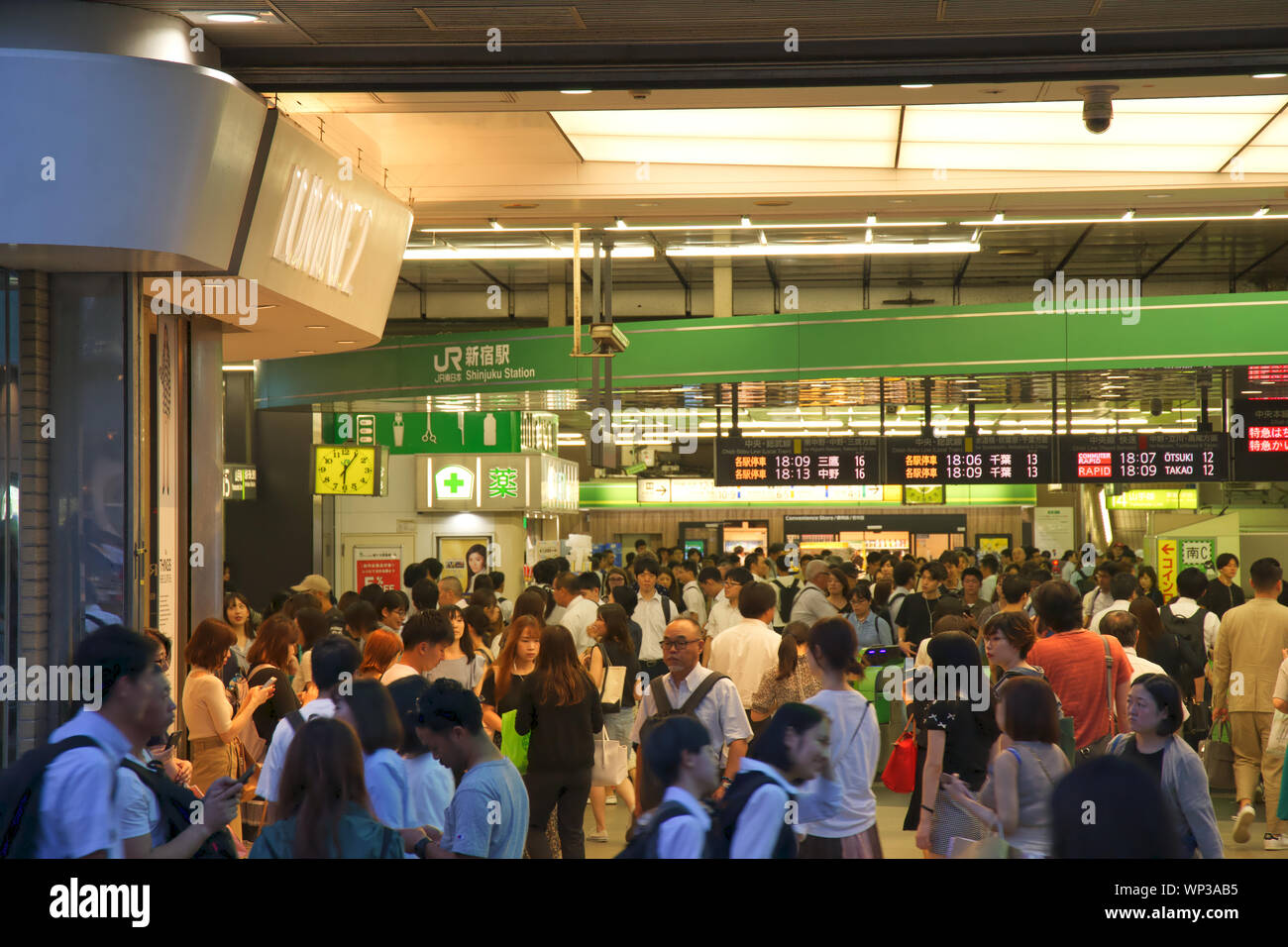 Street scenes with traffic and pedestrian intersection in Shinjuku City ...