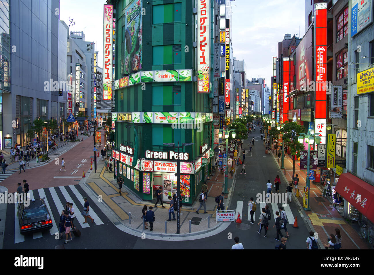 Street scenes with traffic and pedestrian intersection in Shinjuku City ...