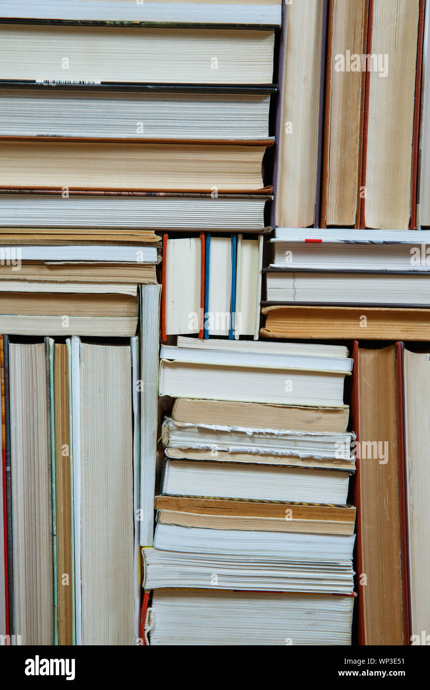 Books stack texture and background Stock Photo - Alamy
