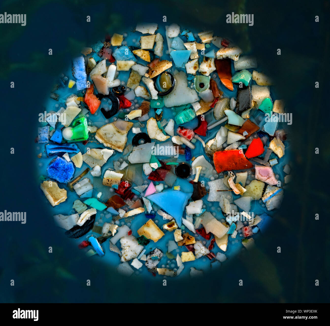 Plastic particles and waste pollution Stock Photo - Alamy