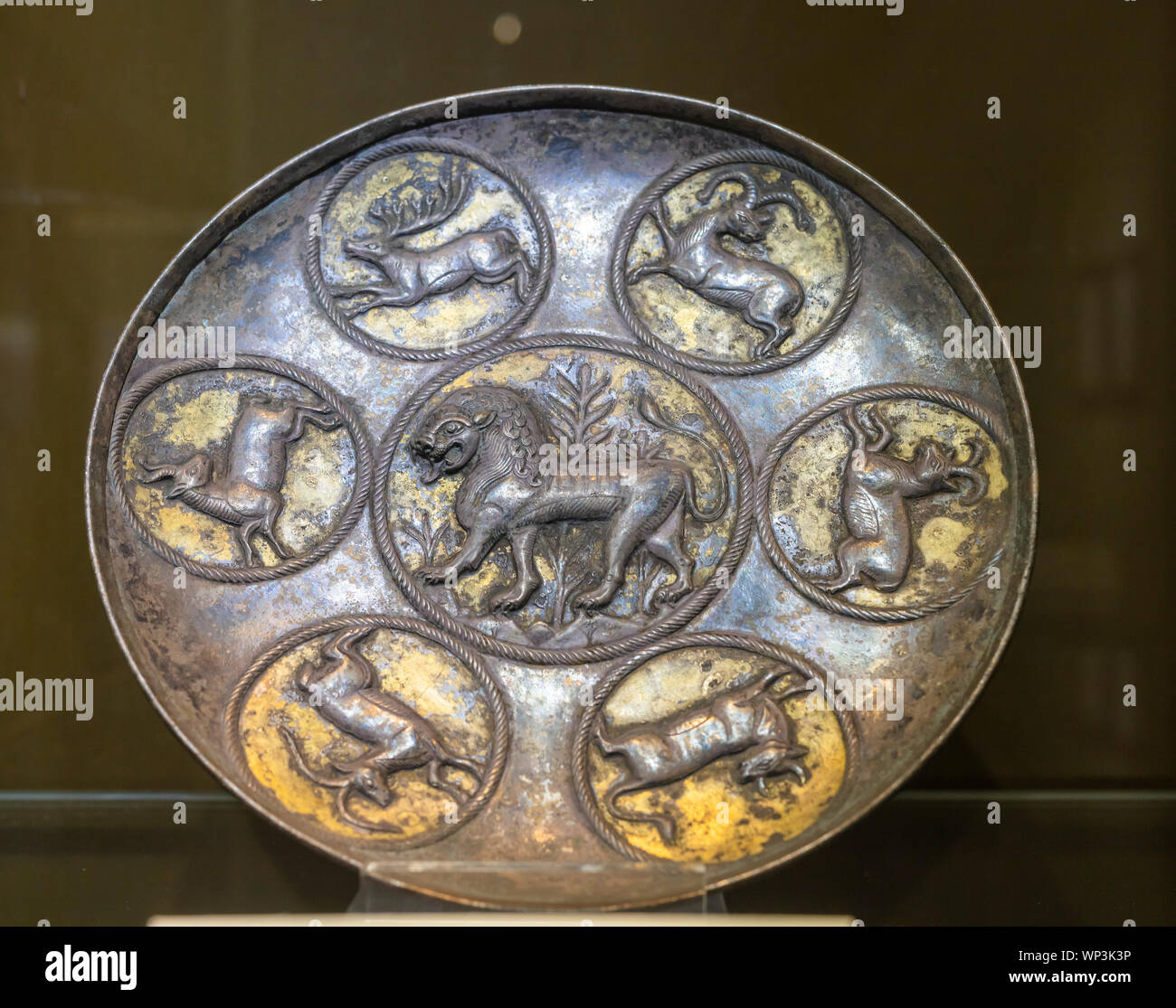Plate with lion, ibex and stag, silver, 5th century, Sassanian, Reza ...