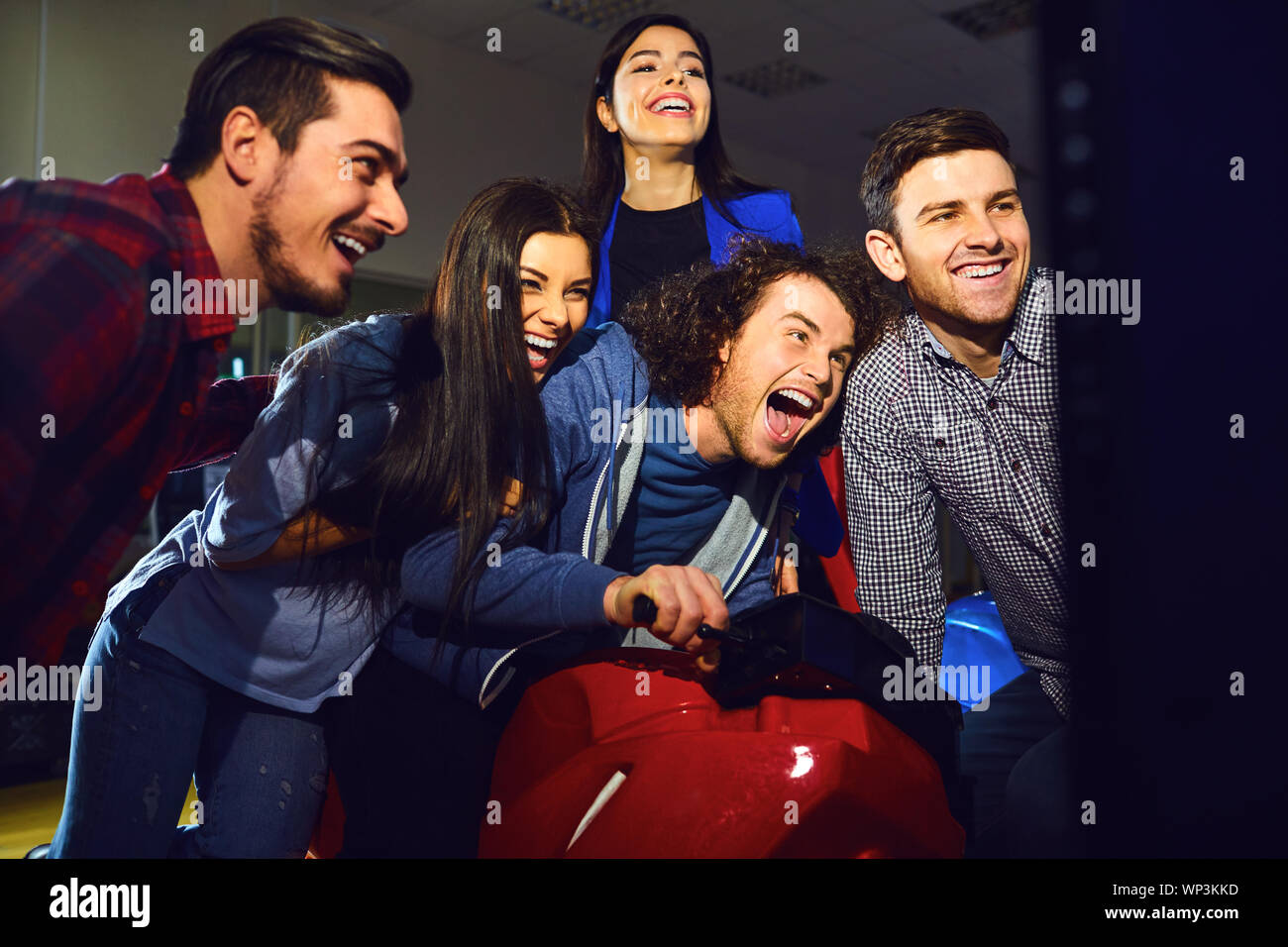 Man playing arcade game hi-res stock photography and images - Alamy