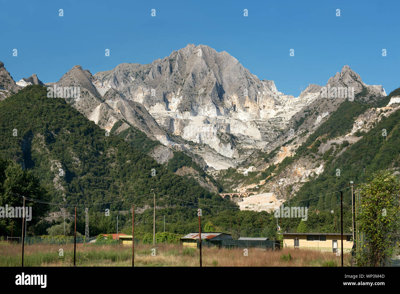 Carrara marble quarries and mountain caves or open cast mines viewed ...