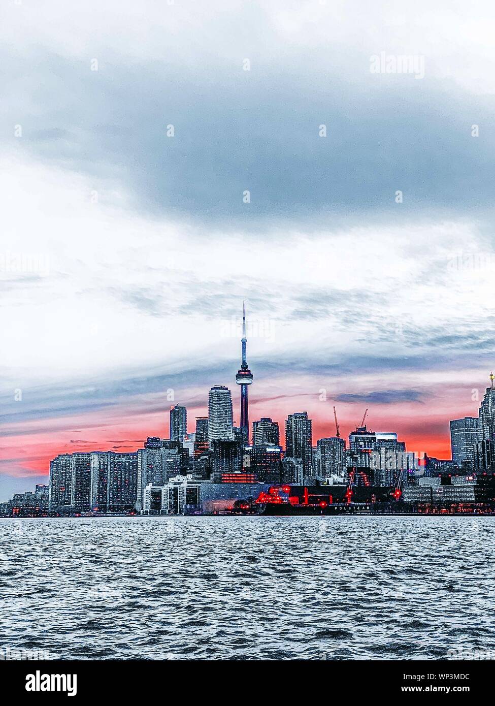 Beautiful shot of an urban city skyline with buildings and radio tower ...