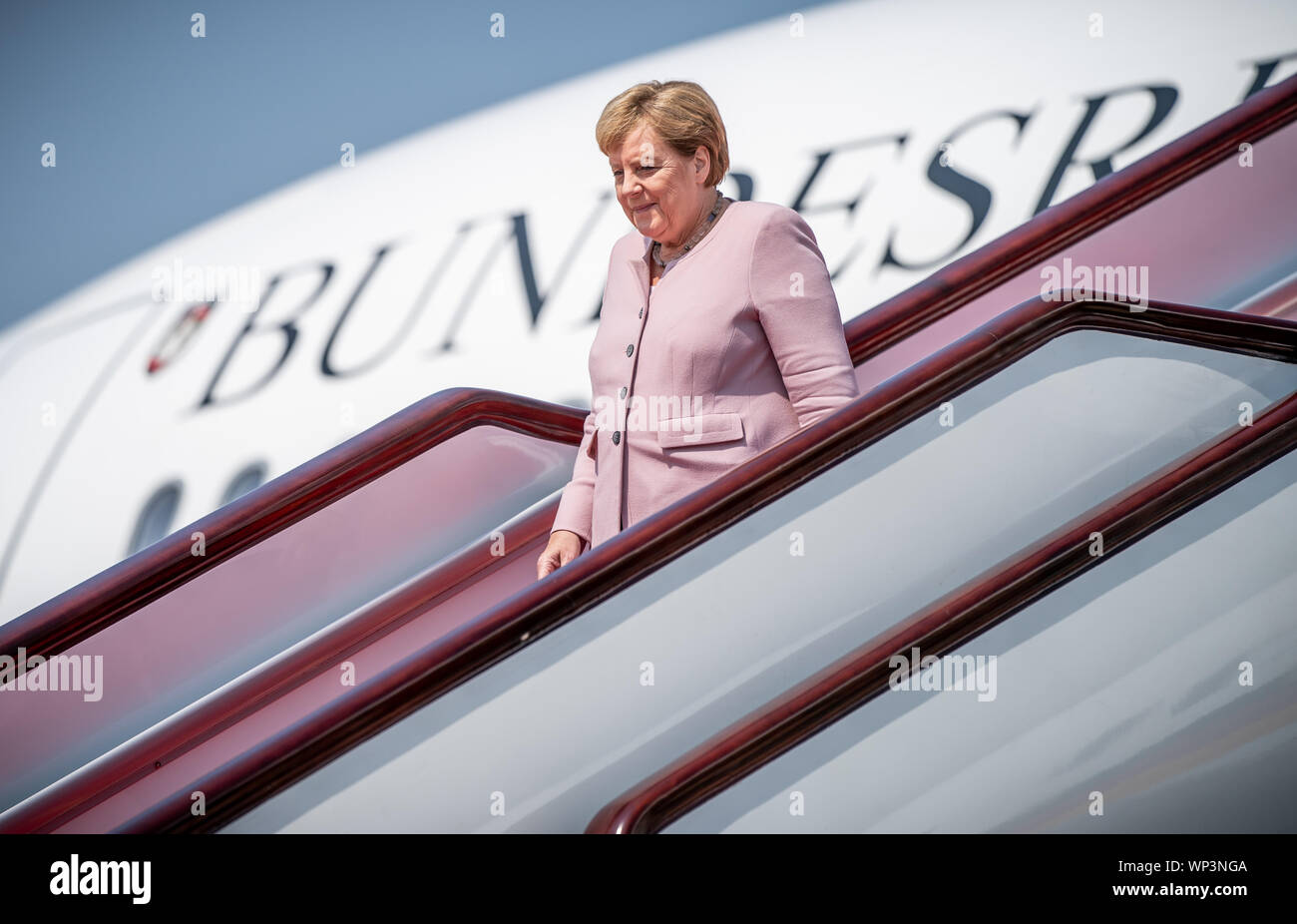Wuhan, China. 07th Sep, 2019. Chancellor Angela Merkel gets off the ...